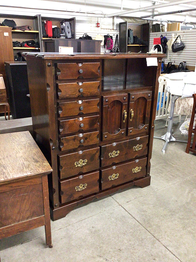This isn't just a cabinet; it's furniture with stories to tell and enough drawers to hide evidence of your chocolate addiction.