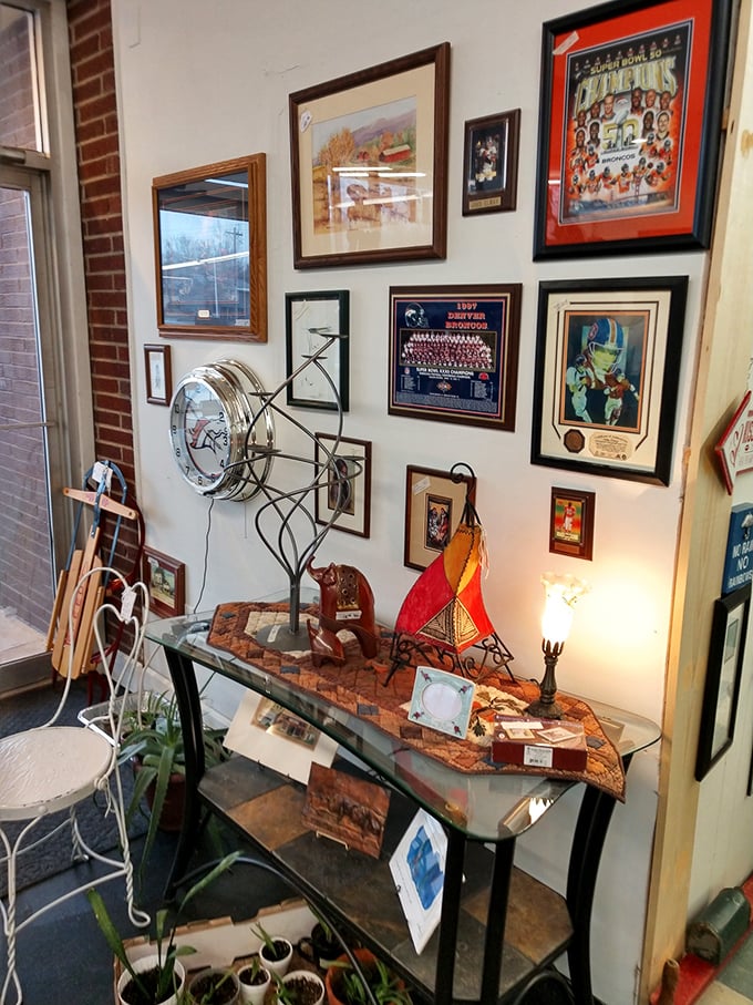 Sports memorabilia and vintage art create a gallery wall that's part museum, part time machine, and entirely fascinating.