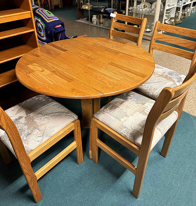 Solid oak craftsmanship that laughs at your wobbly IKEA assembly. This dining set has survived multiple decades and family Thanksgivings unscathed.