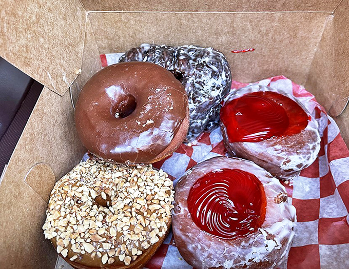 Donut nirvana awaits in this box of handcrafted treasures. Diet plans enter at their own risk.