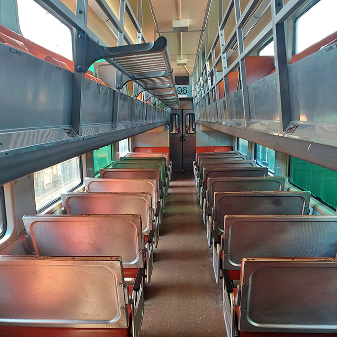 Step inside a vintage passenger car where every seat tells a story of journeys taken and landscapes watched through windows like moving paintings.
