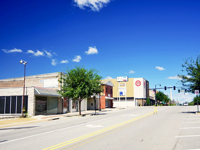 Another angle of downtown reveals the architectural equivalent of a mullet: historic business in the front, modern convenience in the back.
