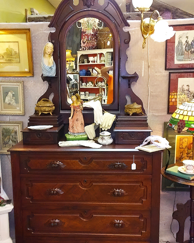 This isn't just a dresser&mdash;it's a Victorian time capsule. The ornate mirror reflects a hundred years of morning routines and special occasions.