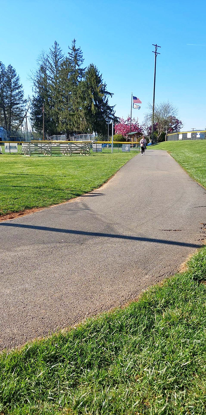 Walking paths wind through manicured green spaces, offering the perfect low-impact workout with a side of small-town serenity.