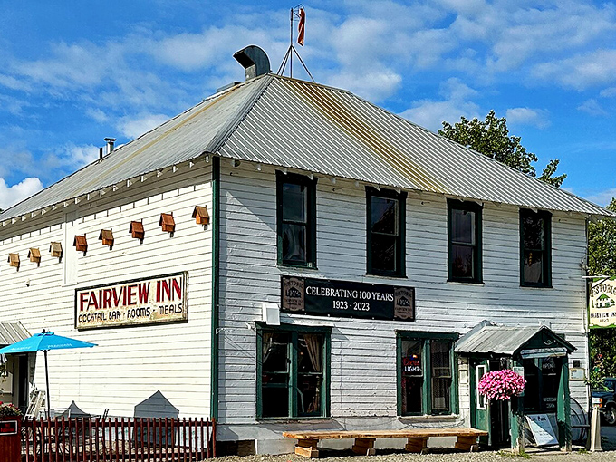 The Fairview Inn celebrates its centennial with the same weathered dignity of someone who's seen it all but still loves a good party.