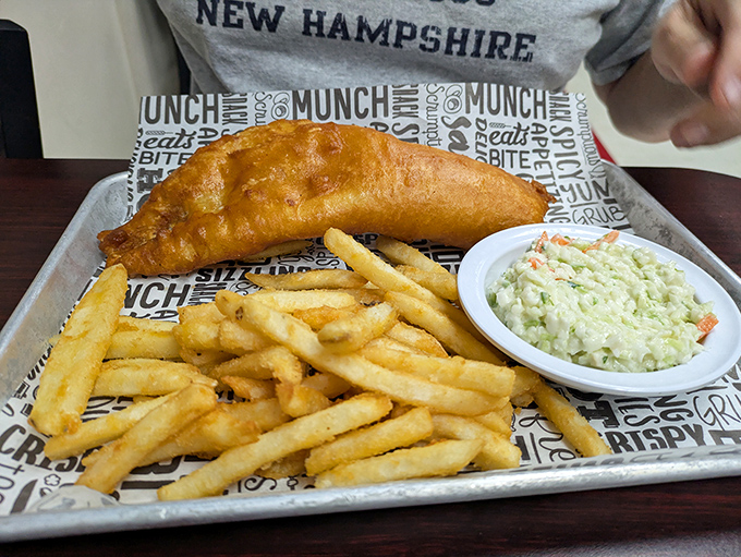 Fish and chips that would make a British pub jealous, with coleslaw so fresh it deserves its own fan club.