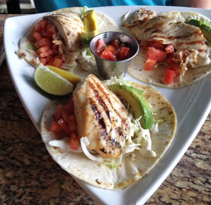 Fish tacos that make you question why you ever ate anything else. The lime wedges aren't just garnish&mdash;they're the exclamation points at the end of a delicious sentence.