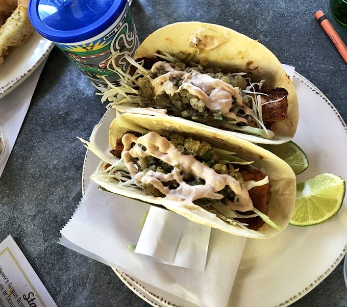 These fish tacos don't just speak to you &ndash; they sing a three-part harmony of crunch, zest, and creamy goodness that'll haunt your dreams.