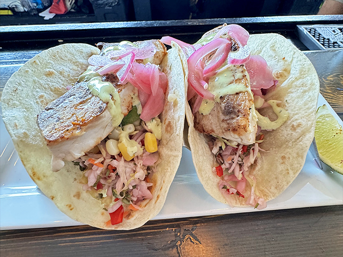 These fish tacos aren't just a meal&mdash;they're a vacation on a plate. The pickled onions add that perfect zing that makes you wonder why you'd eat anything else.