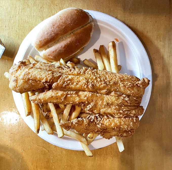 Golden haddock fillets that shatter at first bite, paired with fries that actually taste like potato. Fast food chains should take notes.
