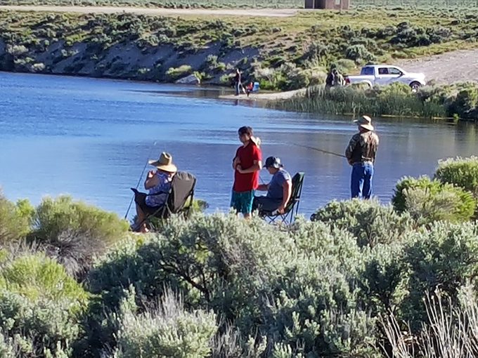 Family fishing time at Cave Lake&mdash;where "I caught one this big" stories are actually true for once.