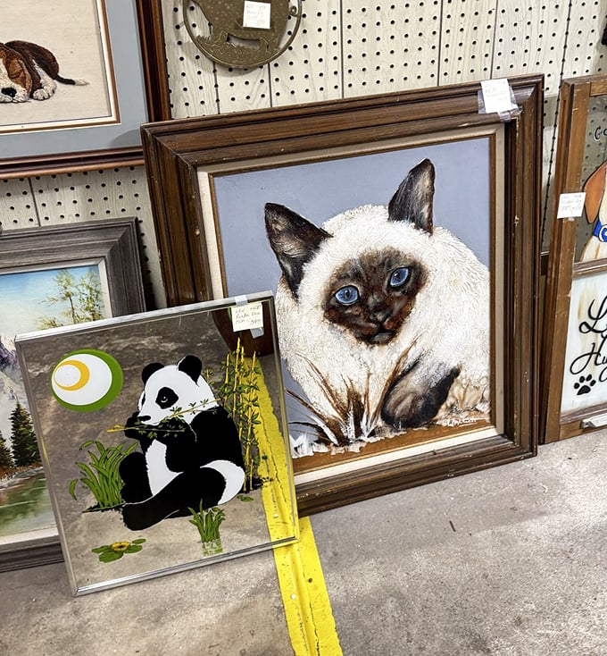 Where else can you find a Siamese cat portrait keeping company with a panda? Art that wouldn't make the Louvre but might make your living room legendary.