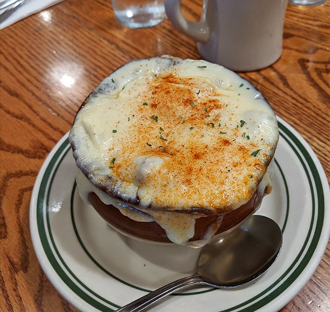 Not just any French onion soup&mdash;a bubbling cauldron of cheese-capped comfort. The kind that makes you want to write sonnets about melted Gruy&egrave;re.