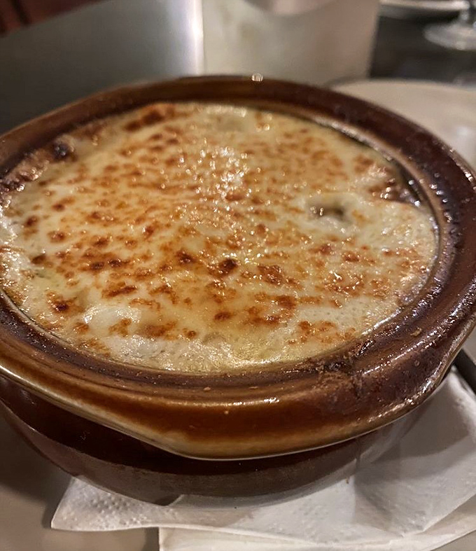 This isn't just French onion soup&mdash;it's a bubbling cauldron of comfort topped with a golden crown of melted cheese that stretches with each spoonful.