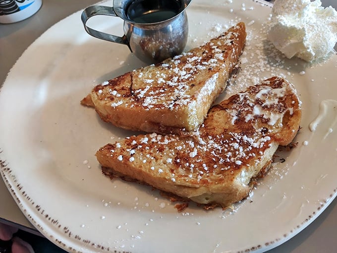 French toast that's dressed for success, dusted with powdered sugar like fresh Michigan snow on a winter morning.