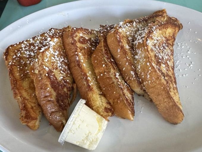 French toast that makes you question why you'd ever make it at home &ndash; golden, crispy edges giving way to custardy centers. Pure morning bliss.