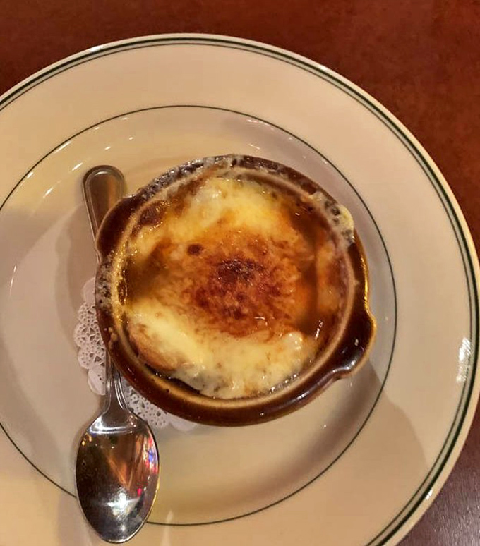 French onion soup with a cheese cap that could double as a delicious umbrella on a rainy day.