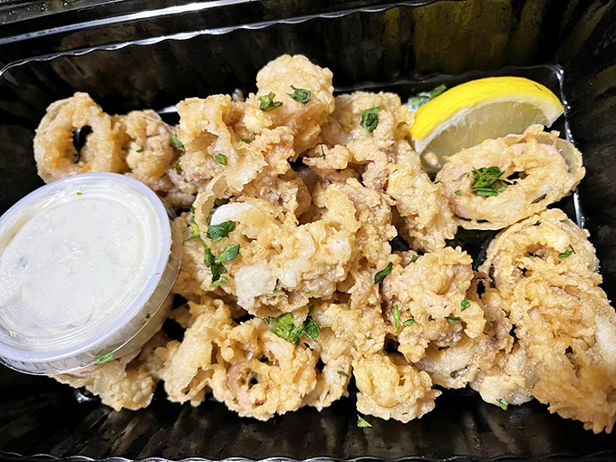 These golden-fried calamari rings aren't just appetizers&mdash;they're edible Olympic medals for your taste buds, complete with victory dipping sauce.