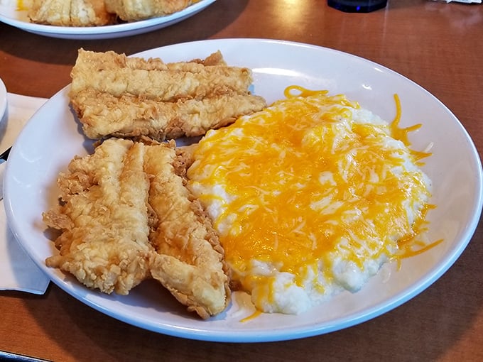 Crispy fried cod and cheesy grits &ndash; a pairing so satisfying it might make you forget your cardiologist's phone number.