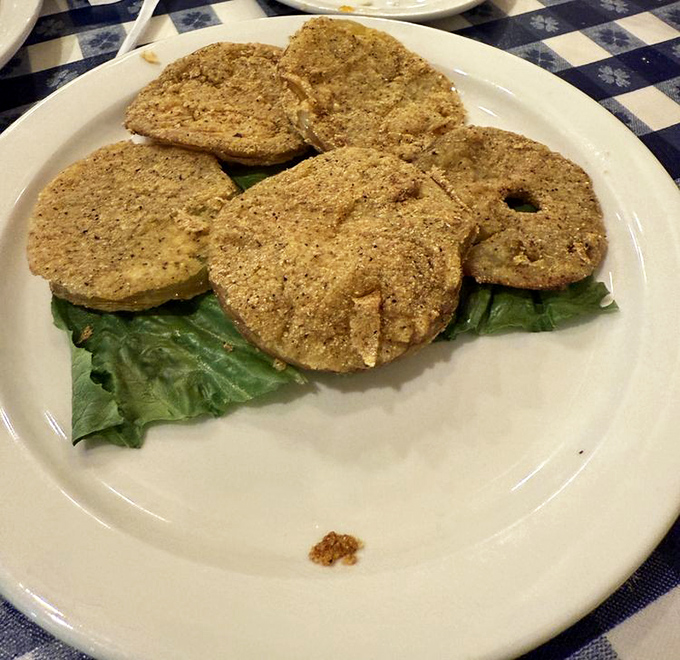 Fried green tomatoes: crispy, cornmeal-crusted Southern classics that make you wonder why we ever eat them red.