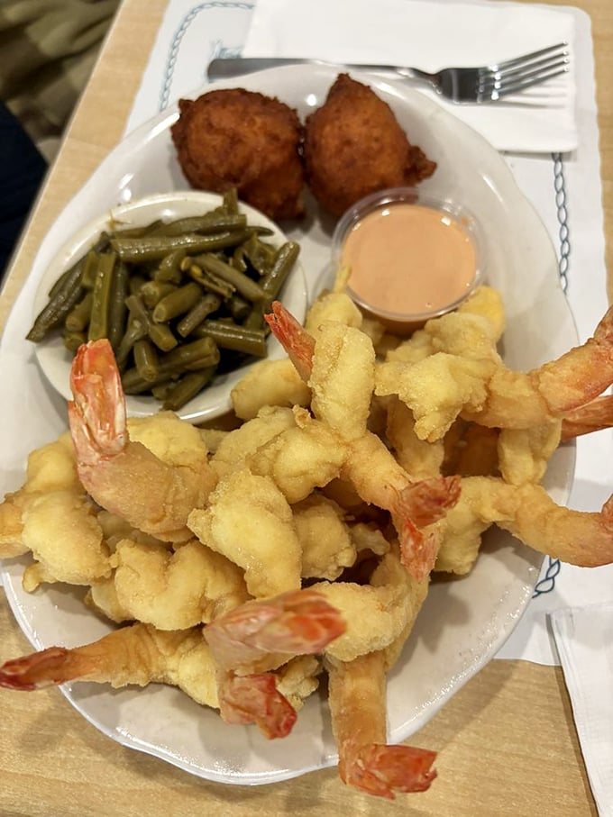 These golden-fried shrimp aren't just seafood – they're edible sunshine with tails. The light breading lets the sweet local shrimp remain the undisputed star.