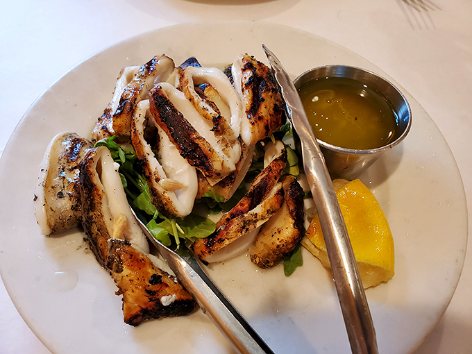 Grilled calamari that will make you question why anyone bothers to fry it. Tender, charred perfection with a squeeze of lemon&mdash;simplicity that speaks volumes.