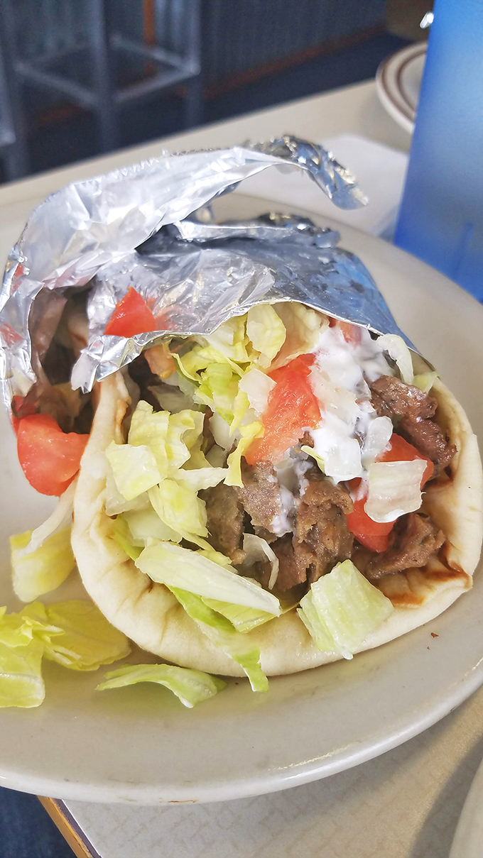 This isn't just a gyro&mdash;it's a Mediterranean vacation wrapped in warm pita. Fresh, vibrant, and absolutely worth the napkins you'll need.