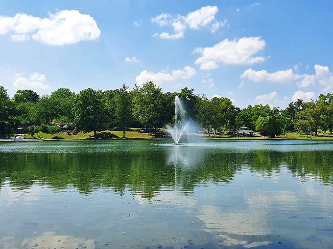 City Park's serene lake and fountain create a peaceful retreat where retirement dollars stretch as far as the reflections on the water's surface.