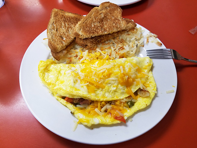 A proper omelet with perfectly golden toast&mdash;the breakfast equivalent of finding front-row concert tickets in your coat pocket.