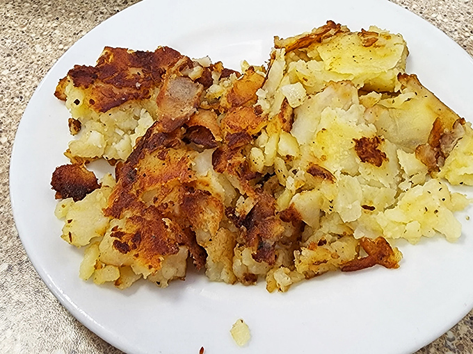 These home fries didn't just fall off a truck&mdash;they were lovingly coaxed to golden perfection, each crispy edge a testament to diner griddle mastery.