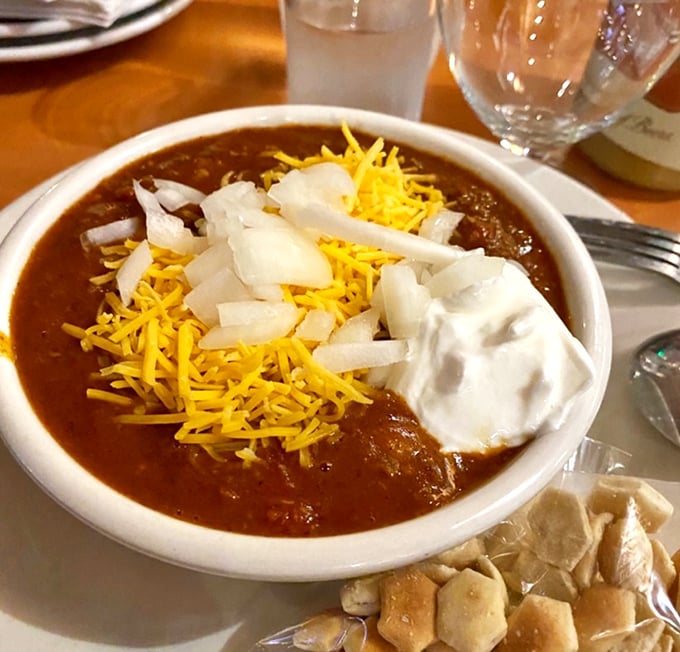 This isn't just chili&mdash;it's a warm Chicago hug in a bowl, topped with the holy trinity of cheese, onions, and sour cream.