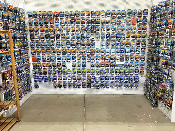 Hot Wheels heaven! A wall of miniature automotive dreams where grown men suddenly remember being eight years old.