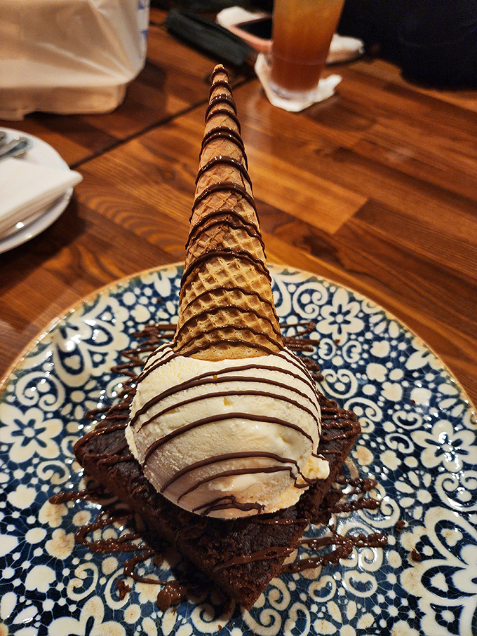 Dessert architecture at its finest. This brownie-ice cream cone creation doesn't just satisfy your sweet tooth&mdash;it throws a party for it.