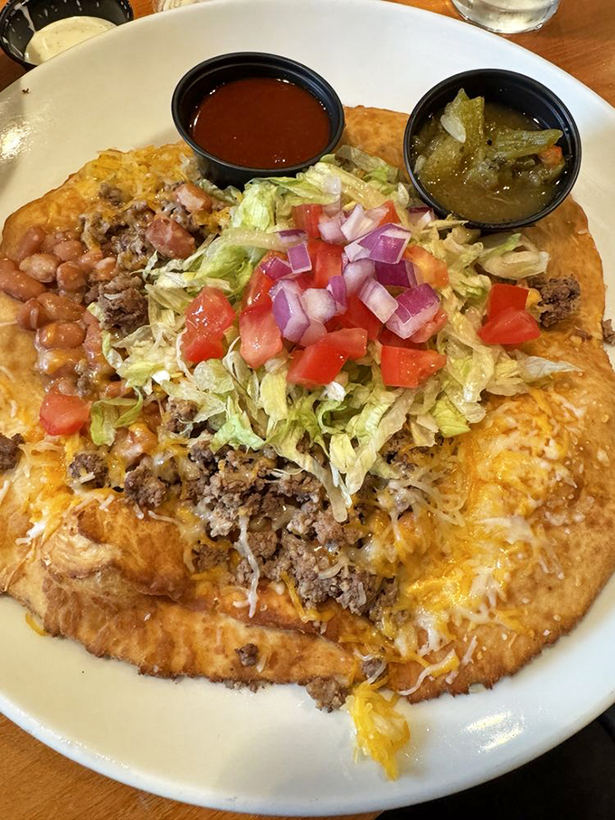 The Indian Taco isn't just a meal&mdash;it's an architectural marvel of Pueblo oven bread supporting layers of flavor that would make Frank Lloyd Wright jealous.
