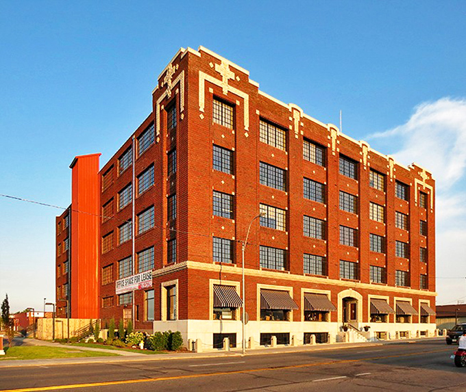 The majestic Inter-State Grocery Building stands as a testament to Joplin's mining boom days. Now repurposed for modern use, it's like seeing your high school principal become a cool DJ.