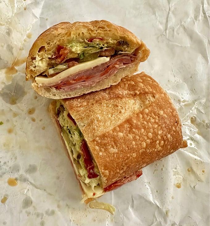 Layer upon glorious layer of Italian meats and cheeses create a sandwich architecture that would make Frank Gehry jealous.