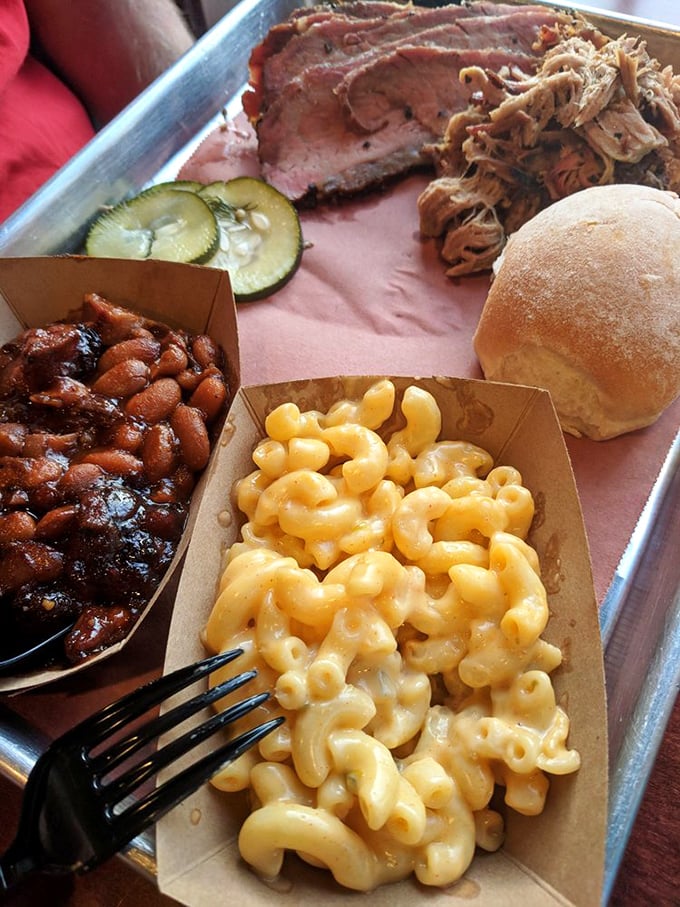 Mac and cheese with pulled pork and baked beans&mdash;proof that side dishes can steal the spotlight when they're this good.