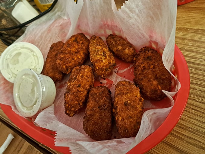 Crispy, golden-brown jalapeno poppers served with dipping sauce &ndash; a perfect side to complement Burger Boy's legendary burgers.