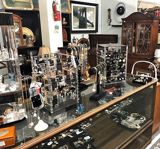 Jewelry displays that sparkle with history. Each brooch and necklace once adorned someone's special occasion outfit.