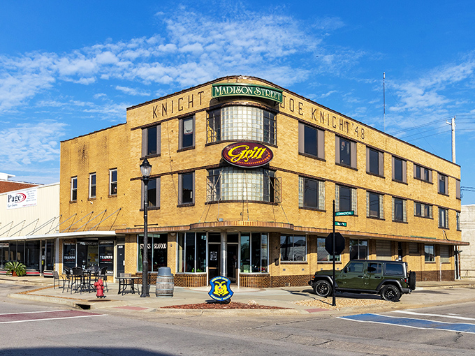 The Joe Knight building anchors Madison Street with Art Deco confidence, a testament to when corner buildings were the crown jewels of small towns.