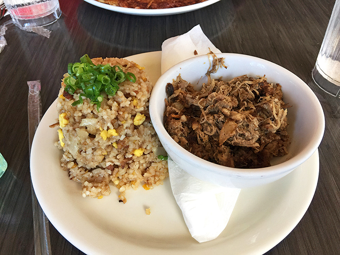 Kalua pork and fried rice&mdash;a Hawaiian breakfast power couple that belongs in the Comfort Food Hall of Fame, bringing island tradition to your morning routine.