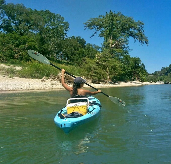 Adventure calls on the Guadalupe River, where paddling through crystal waters offers the perfect blend of exercise and lazy drifting.
