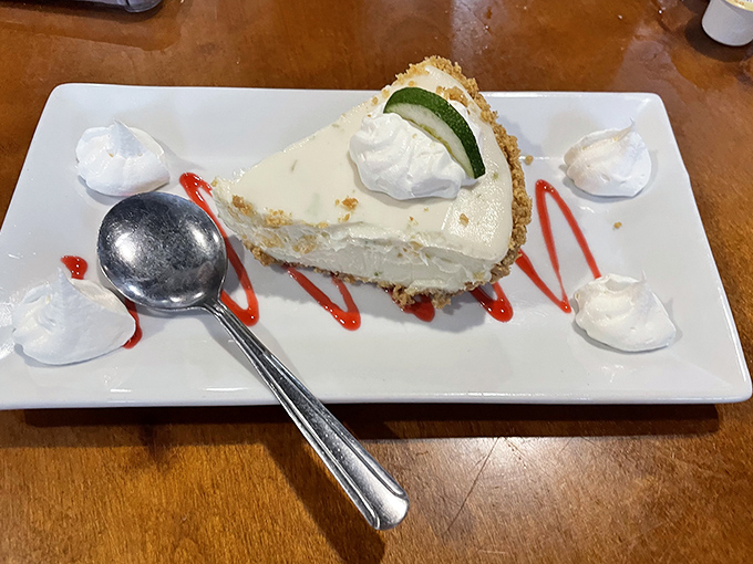 Key lime pie that strikes that perfect balance between sweet and tart—like finding the exact right moment to jump into the ocean on a hot day.
