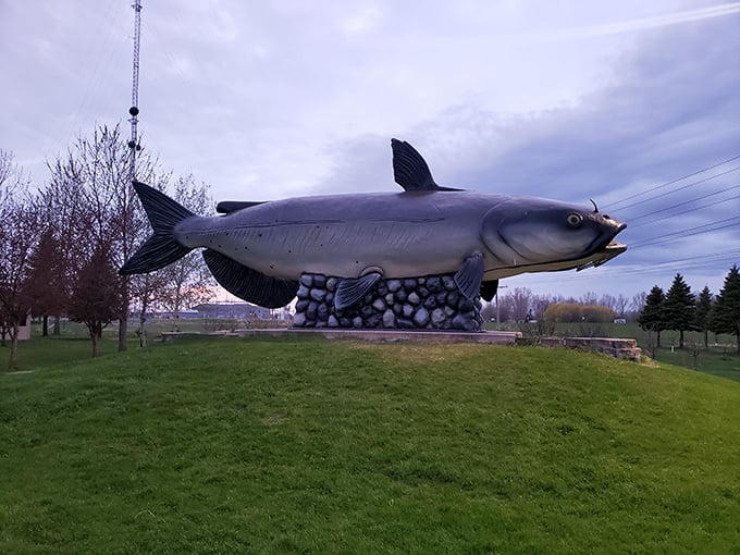 The catfish statue stands proudly, a monument to the local fishing tales that grow as impressively as the fish that got away.