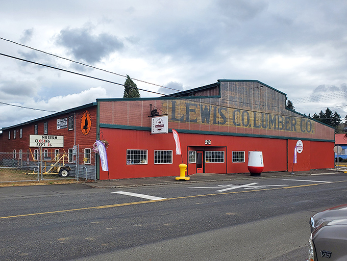 The vibrant red Lewis County Museum building stands as a cheerful guardian of local history, preserving stories of the region's agricultural heritage.