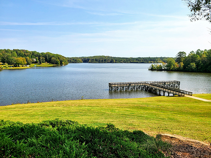 Lake Rabon offers that quintessential Southern tableau – still waters, a perfect fishing pier, and the promise of an afternoon where time stretches like taffy.