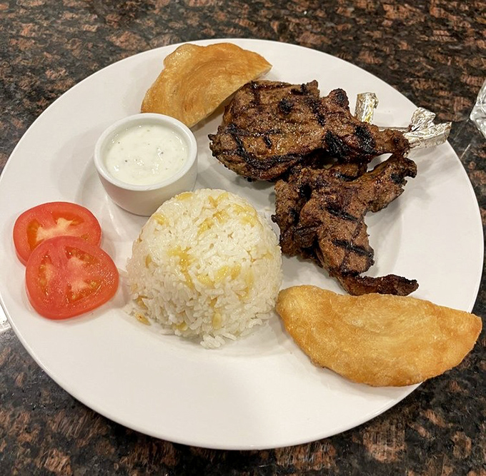 These lamb chops aren't just cooked—they're transformed. Paired with fluffy rice and yogurt sauce, it's the kind of plate that silences conversation.