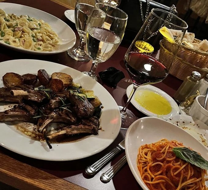 Three distinct pasta preparations share the table with perfectly grilled lamb chops&mdash;the Italian version of "why choose just one?"