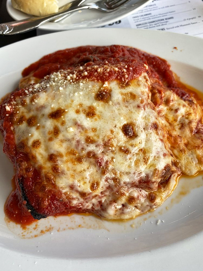 Layers of pasta, meat, and cheese stacked with the kind of precision that would make an Italian grandmother weep.