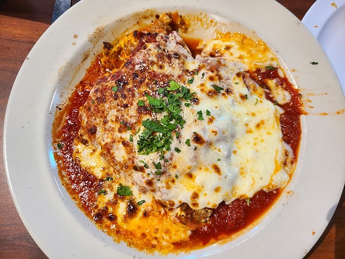 Layers of pasta, cheese, and sauce meld together in this lasagna masterpiece. It's not just dinner; it's an edible hug.